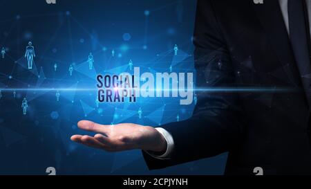 Elegant hand holding SOCIAL GRAPH inscription, social networking ...