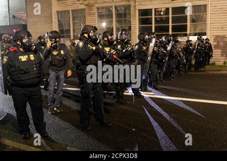 Portland, USA. 18th Sep, 2020. Federal SWAT teams fire on demonstrators ...