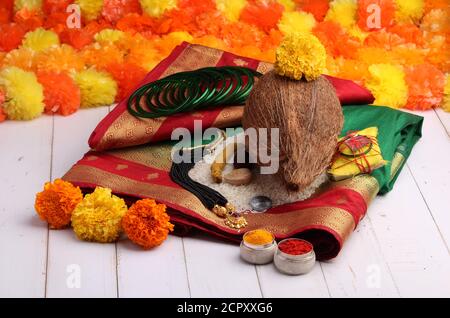 oti bharne- Indian ritual of offering a sari and a blouse piece along ...