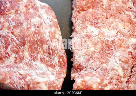 Frozen minced meat texture close up view Stock Photo - Alamy