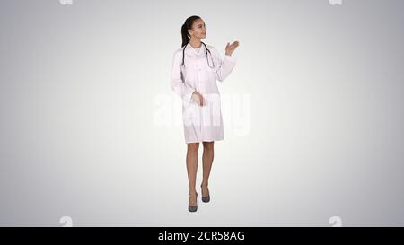 Young Asian woman doctor presenting anatomical organ model during ...