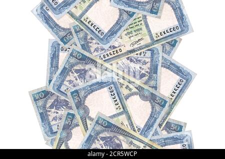 50 Nepalese rupees bills flying down isolated on white. Many banknotes ...