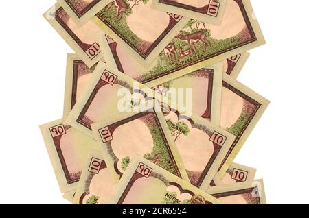 10 Nepalese rupees bills flying down isolated on white. Many banknotes ...