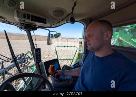 Cockpit of a combine harvester Stock Photo - Alamy