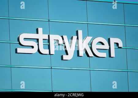 Stryker sign and logo at medical technologies firm Stryker Corporation ...