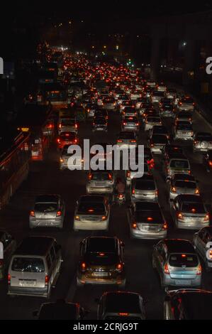 A busy road intersection jammed with traffic in the city centre of ...