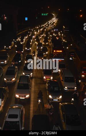 A busy road intersection jammed with traffic in the city centre of ...