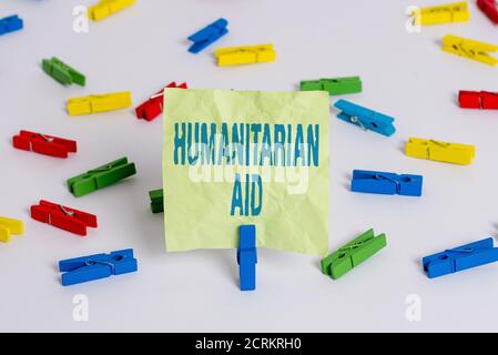 Writing note showing Humanitarian Aid. Business concept for immediate ...