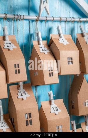 Christmas Advent Calendar made of cardboard against white background ...