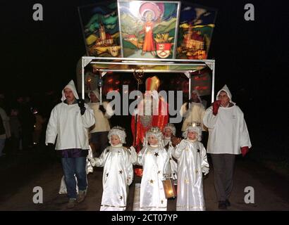Children carrying lanterns during a parade of St. Martin's Day, which ...