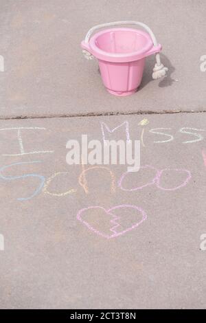 I miss school chalk sign in driveway Stock Photo - Alamy