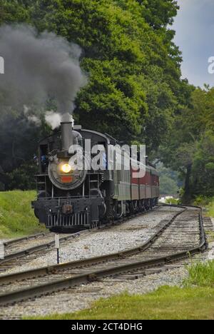 Vertical shot of a steam locomotive with old wagons of Harzer ...