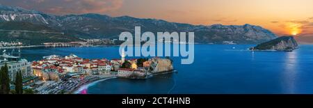 An aerial view of the cityscape of Budva at night, Montenegro Stock ...