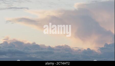 clouds slowly float in the sky during sunset, nature Stock Photo - Alamy