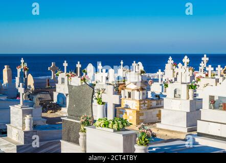 Traditional Greek cemetery with white marble tombs at Sami on the ...