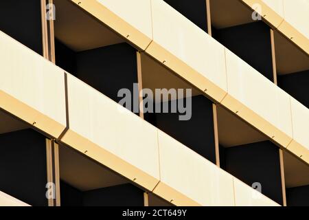 Balconies of building. House cladding. Construction of new residential ...