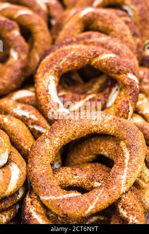 A simit (traditional Turkish pretzel-like pastry) vendor pushes his ...