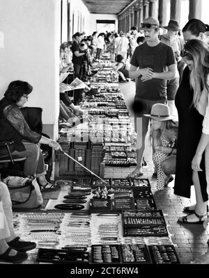 Native American artists sell their artworks in the portal of the ...