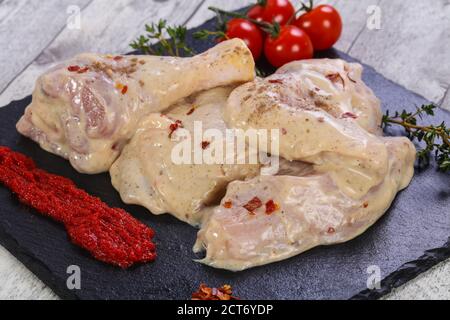 Marinated chicken parts ready for roast Stock Photo - Alamy
