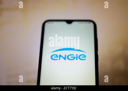 In this photo illustration, the Engie logo is displayed on a smartphone ...