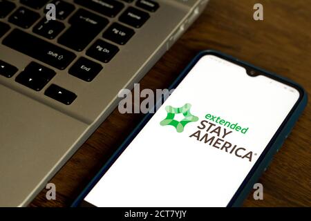 In this photo illustration an Extended Stay America logo of a hotel ...