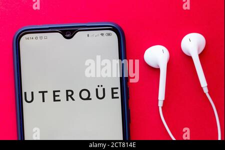 In this photo illustration of the Uterque logo seen displayed on a smartphone Stock Photo - Alamy