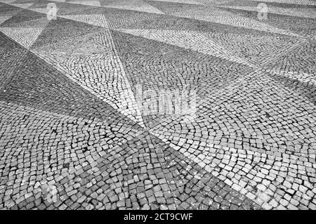 Mosaic tiles pavement background. Triangle paving. Aged photo. Black ...