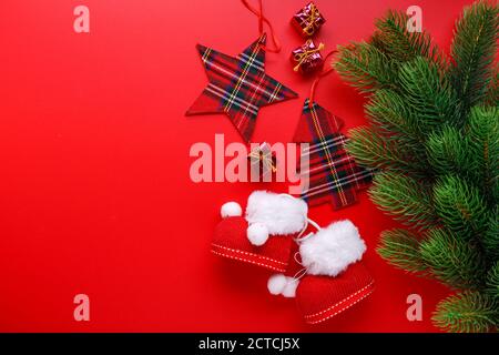 Festive Composition with decorative boots, Christmas decorations and ...