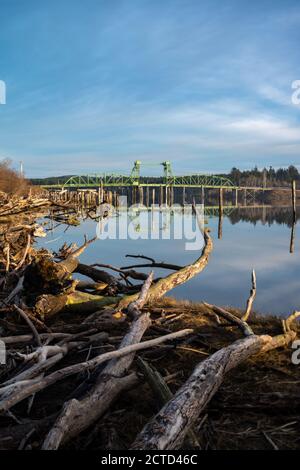 Bullards Bridge in Bandon, Oregon. Driftwood in foreground Stock Photo ...
