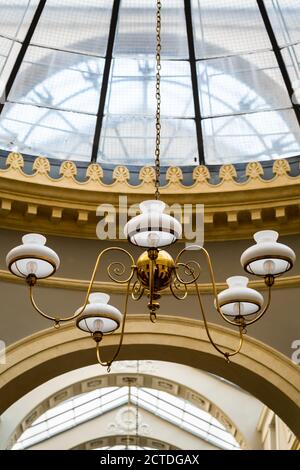 An elaborate ceiling light in Paris Stock Photo - Alamy