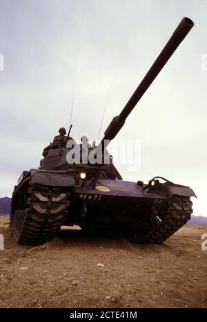 1974 - A US Army tank crew mans an M60 main battle tank during a field ...