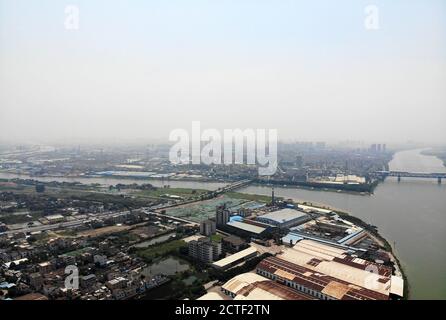 An aerial view of various factories located at a local industrial zone ...