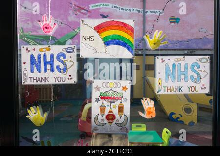 Thank the NHS drawings and paintings on a window in Kingston Hospital ...