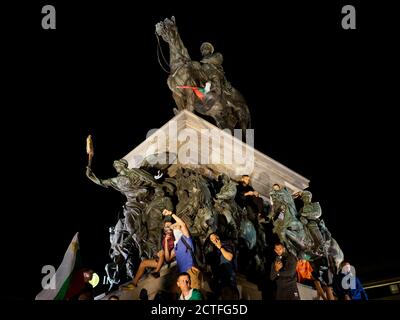 Protesters gather at a Monument to the Tsar Liberator covered with ...