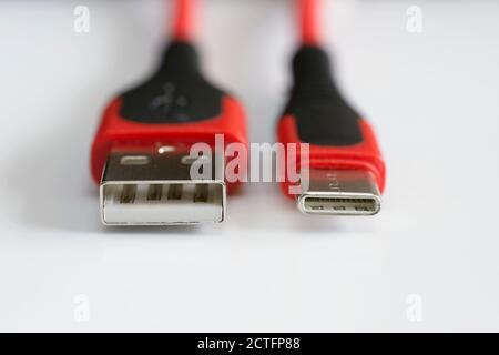Detail of front entrance of USB versus USB-C cable plugs Stock Photo ...
