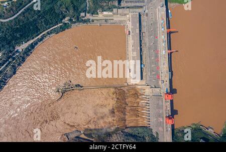 Aerial view of Sanmenxia Dam discharging water due to the flood peak at ...