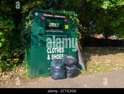 clothes and shoes recycling bin in twickenham, middlesex, england Stock ...