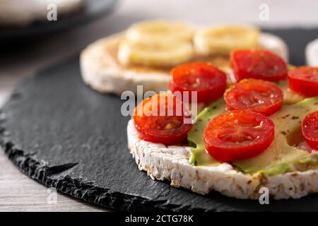 Assortment Puffed rice cake snack on wooden table Stock Photo - Alamy