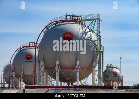 A large oil-refinery plant with Liquefied Natural Gas - LNG - storage ...