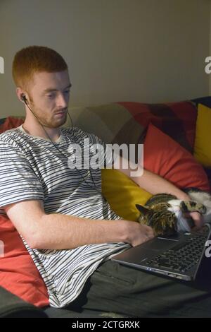 Working from home UK Coronavirus lockdown self isolation. Woman in her ...