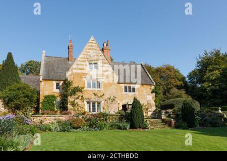 Coton Manor, a 17th century manor house, surrounded by landscaped ...