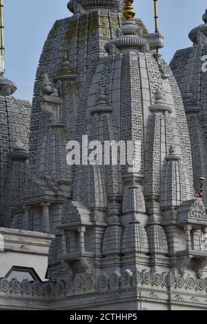 Detail of ornate limestone Hindu temple Shri Vallabh Nidhi Mandir in ...