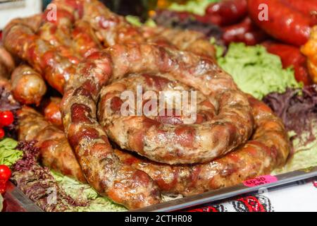 Assortment of grilled sausages for sale. Street food, fast food Stock ...