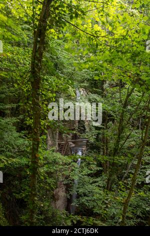 General front view of Samandere Waterfall plashing from high rocks ...