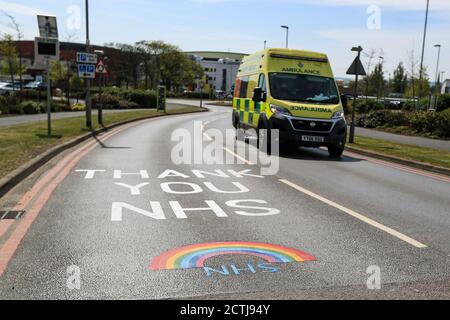 An ambulance passes the ‘Thank You NHS rainbow’ sign at Pinderfields ...