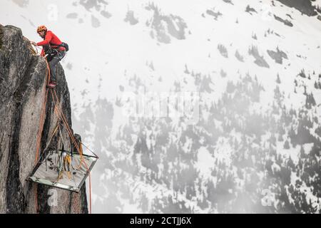 Rock climber uses prusik to ascend cliff above portaledge Stock Photo ...