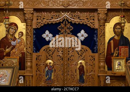 Orthodox icons and iconostasis closeup. When worshipers enters the ...