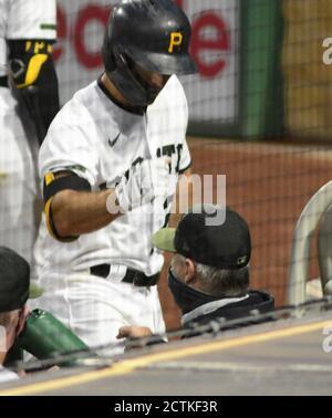 Pittsburgh Pirates second baseman Adam Frazier throws during a baseball ...