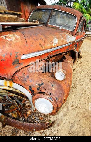 Old rusty car falling apart but somehow still working on the streets of ...