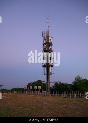 Cell phone relay tower. Metal mast. Metal structure with mounted relays ...